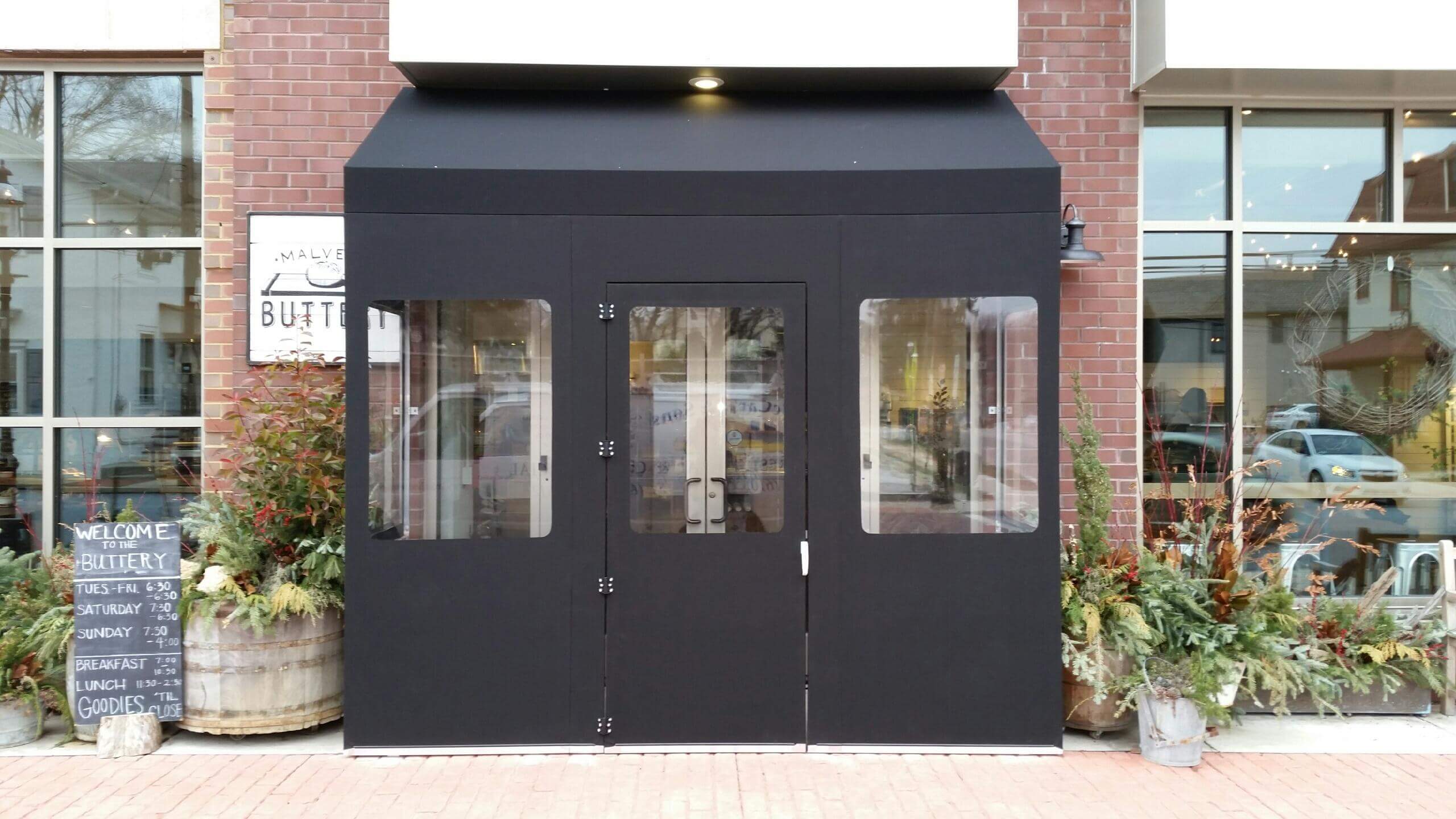 Seasonal, removable creative vestibule awnings - MacCarty and Sons